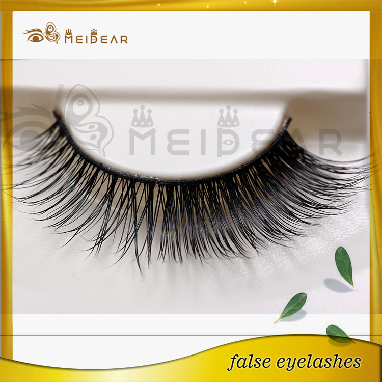 Putting on false eyelashes for make up - Meidear eyelash